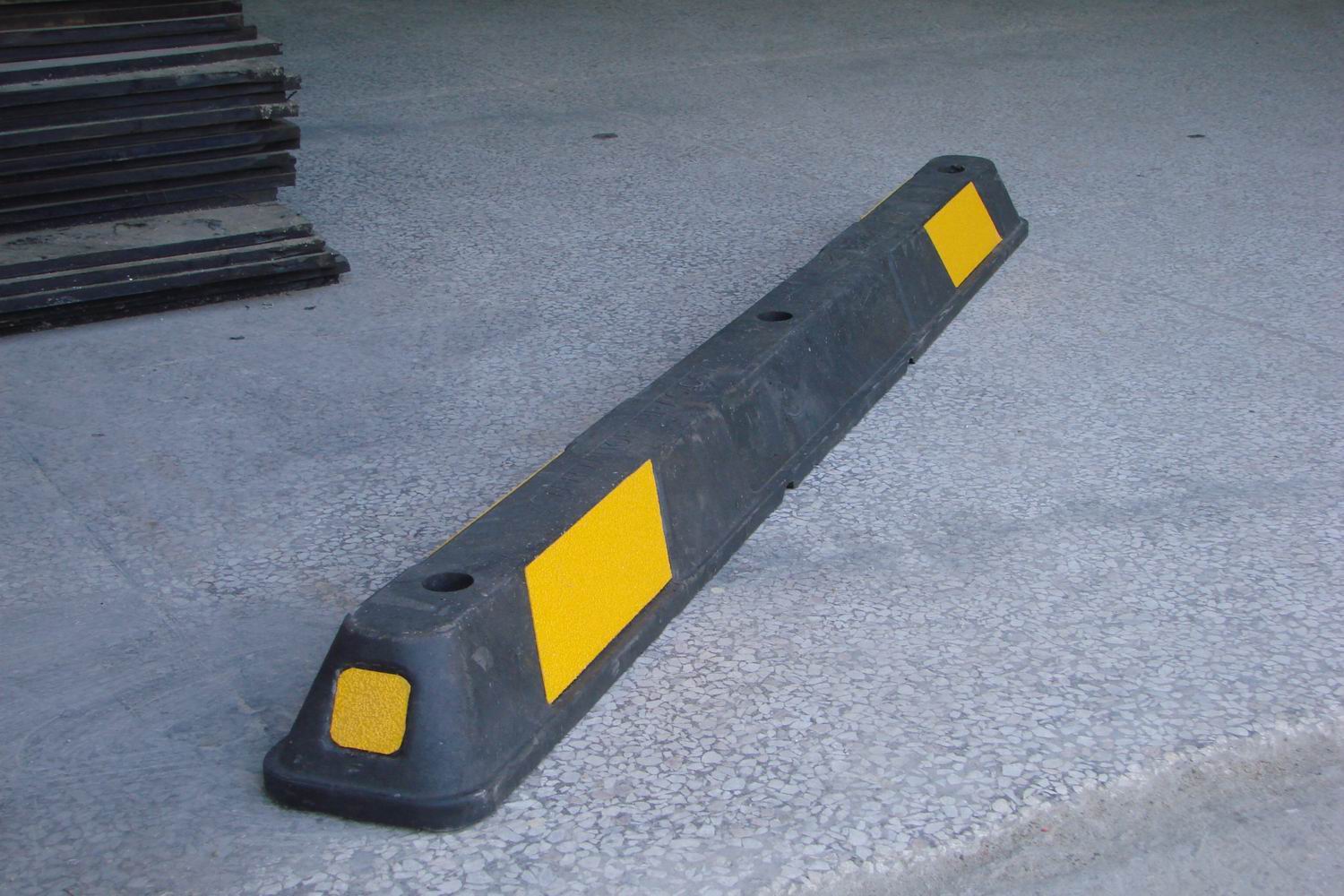 Heavy Duty Wheel Stops | Tuff Stop | Wheel Stops | Astrolift